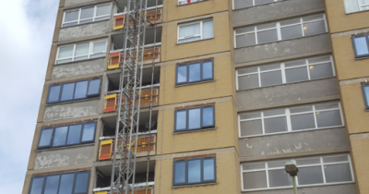 Why are tower block refurbishment projects implemented and whom do they ...
